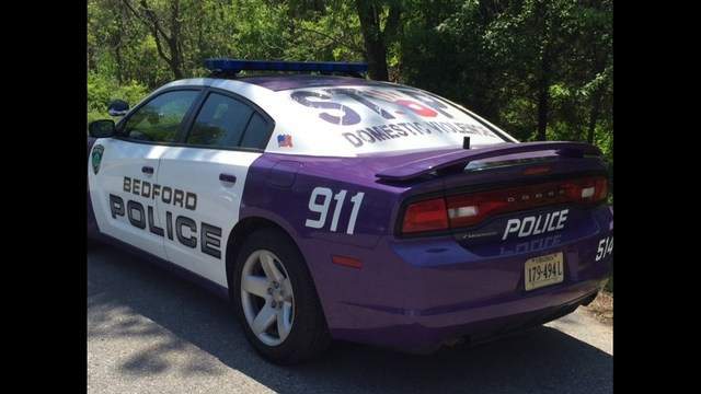 Purple police cars help Bedford raise awareness of domestic violence